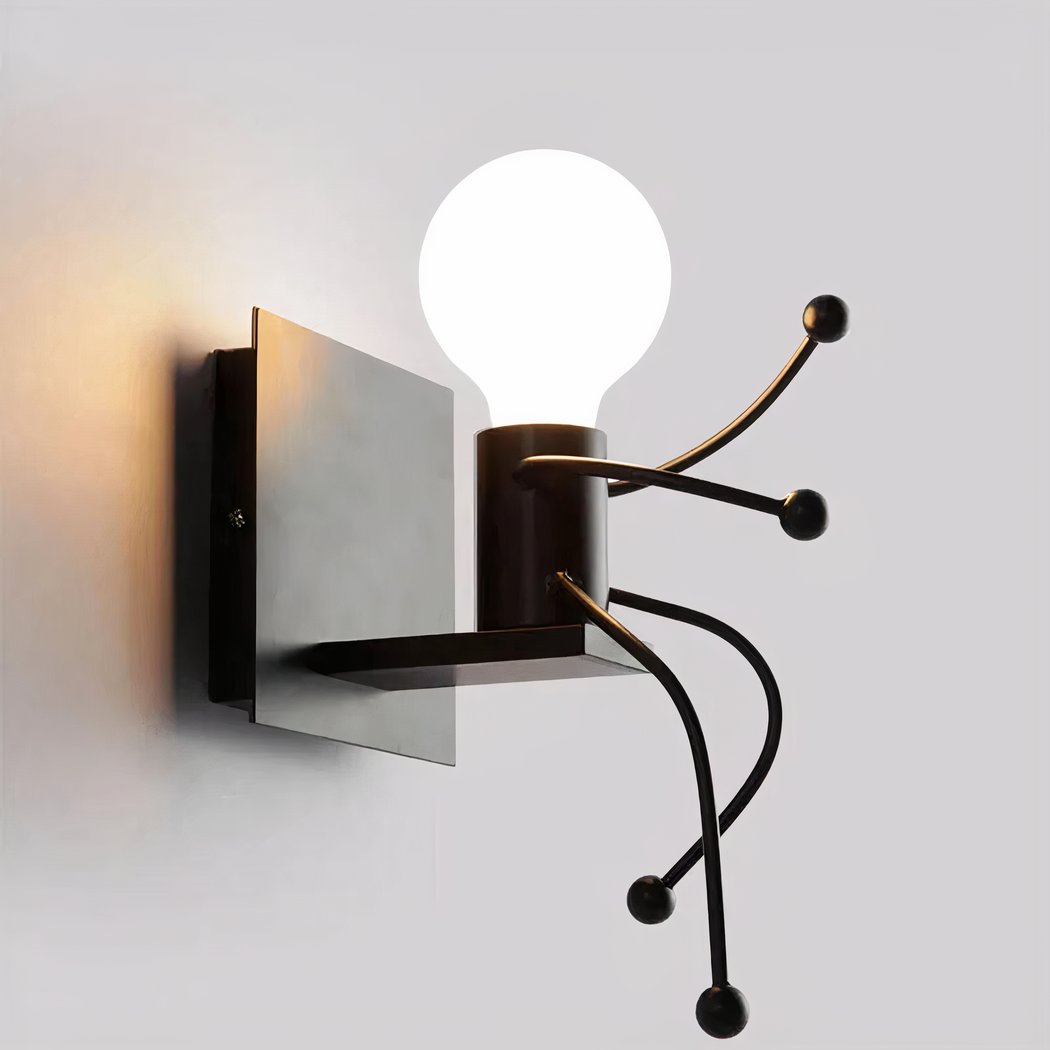 Aplique minimalista y moderno con una figura sentada • Tendencia Luminarias
